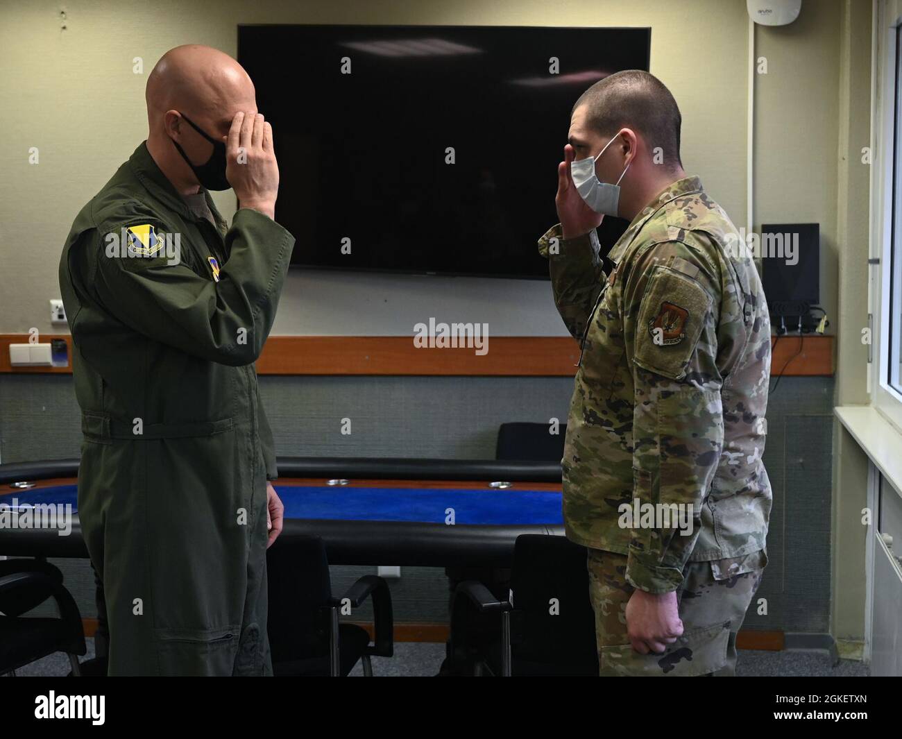 U.S. Air Force Brig. Gen. Josh Olson, 86th Airlift Wing commander, left ...