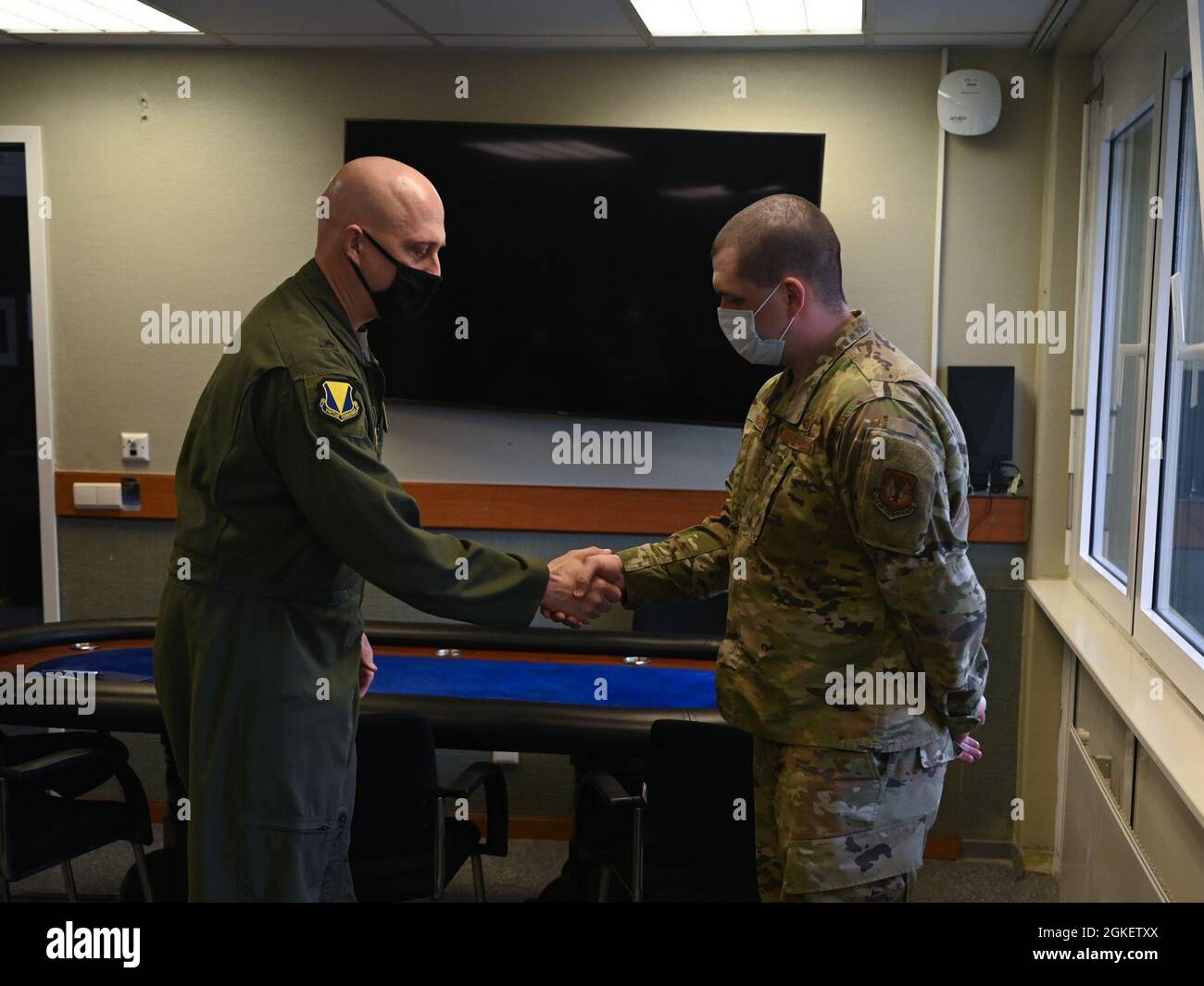 U.S. Air Force Brig. Gen. Josh Olson, 86th Airlift Wing commander, left ...