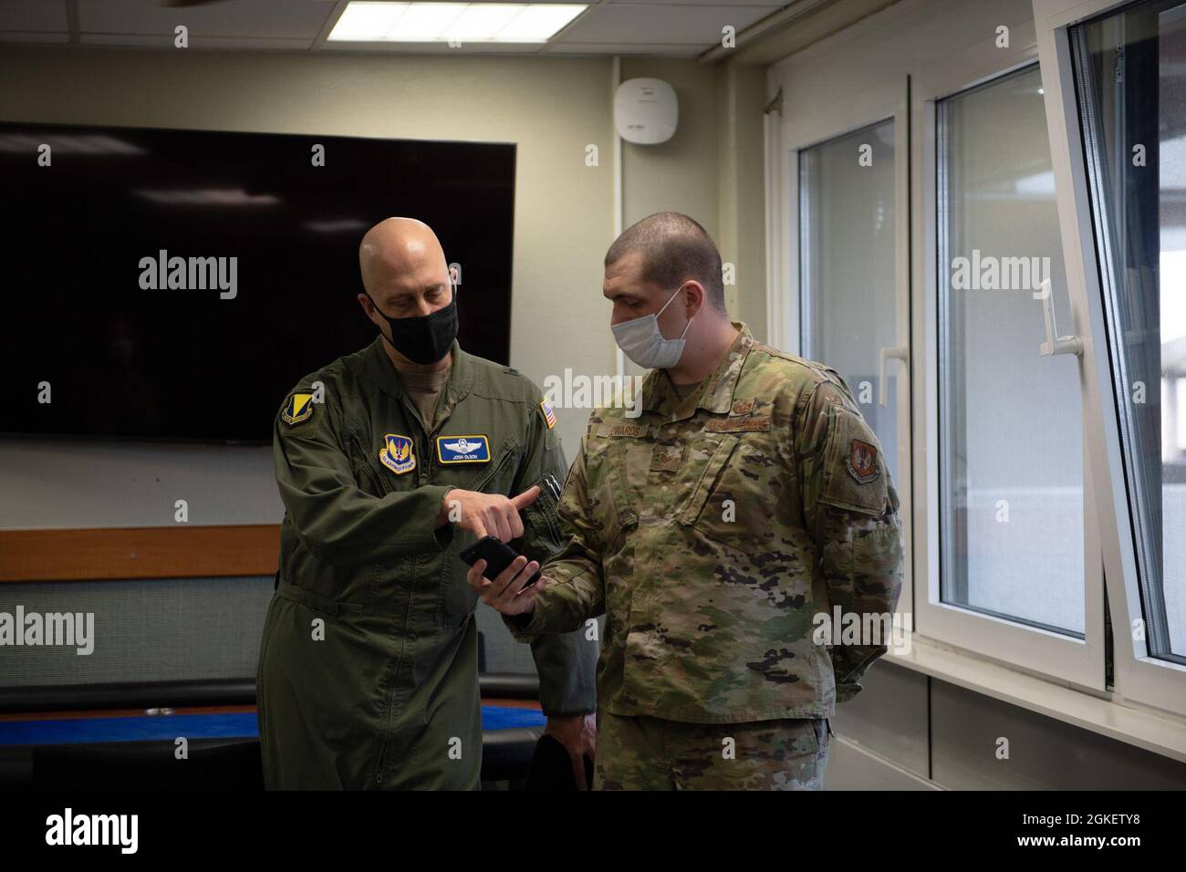 U.S. Air Force Brig. Gen. Josh Olson, 86th Airlift Wing commander, left ...