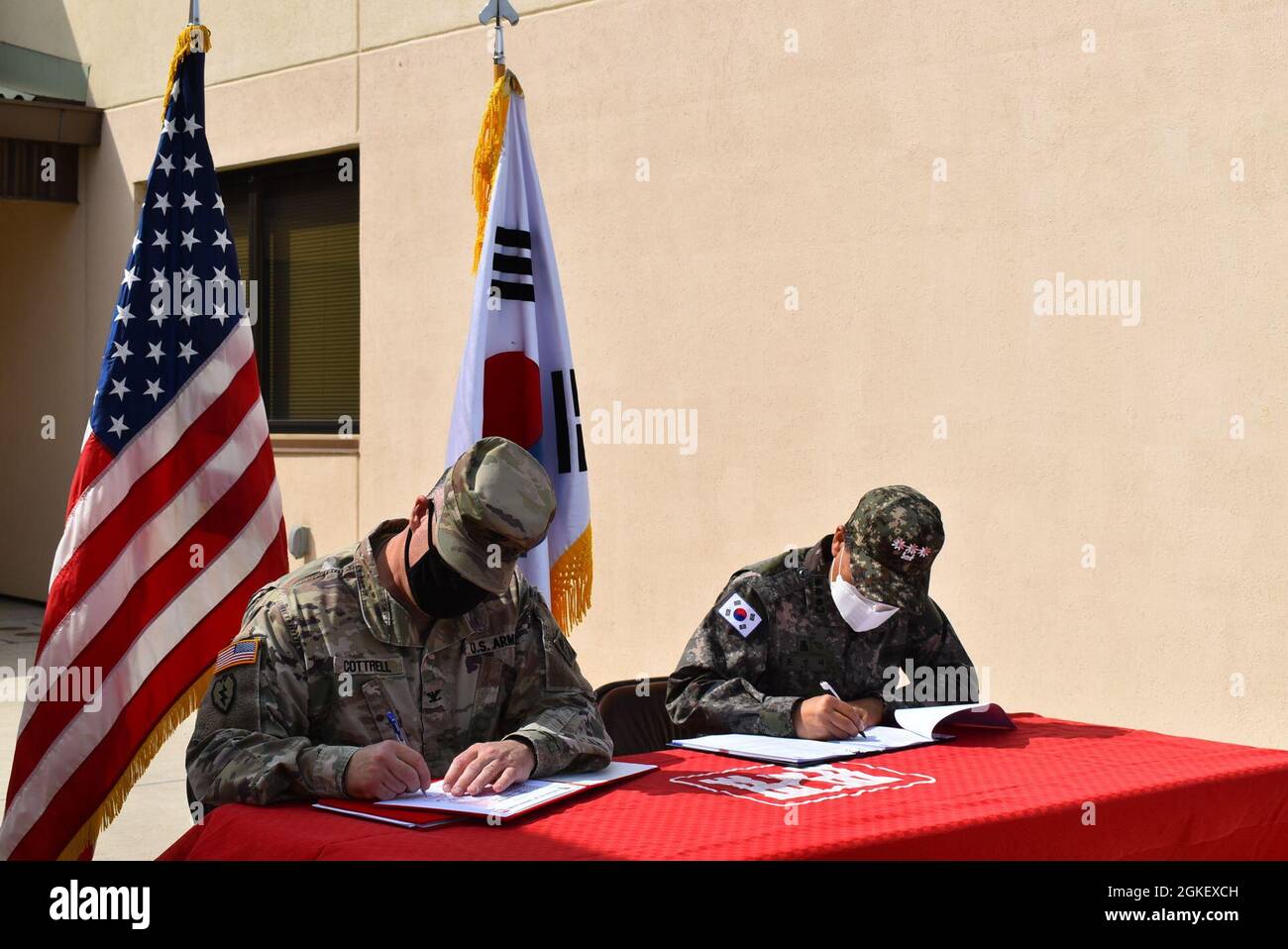 Col. Garrett Cottrell (left), Deputy Commanding Officer ...