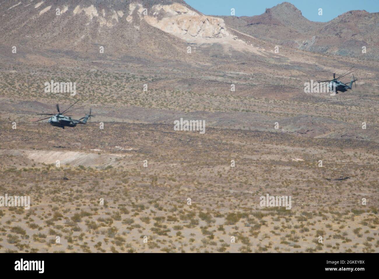 Marines with Marine Heavy Helicopter Squadron (HMH) 366 fly two CH-53E ...