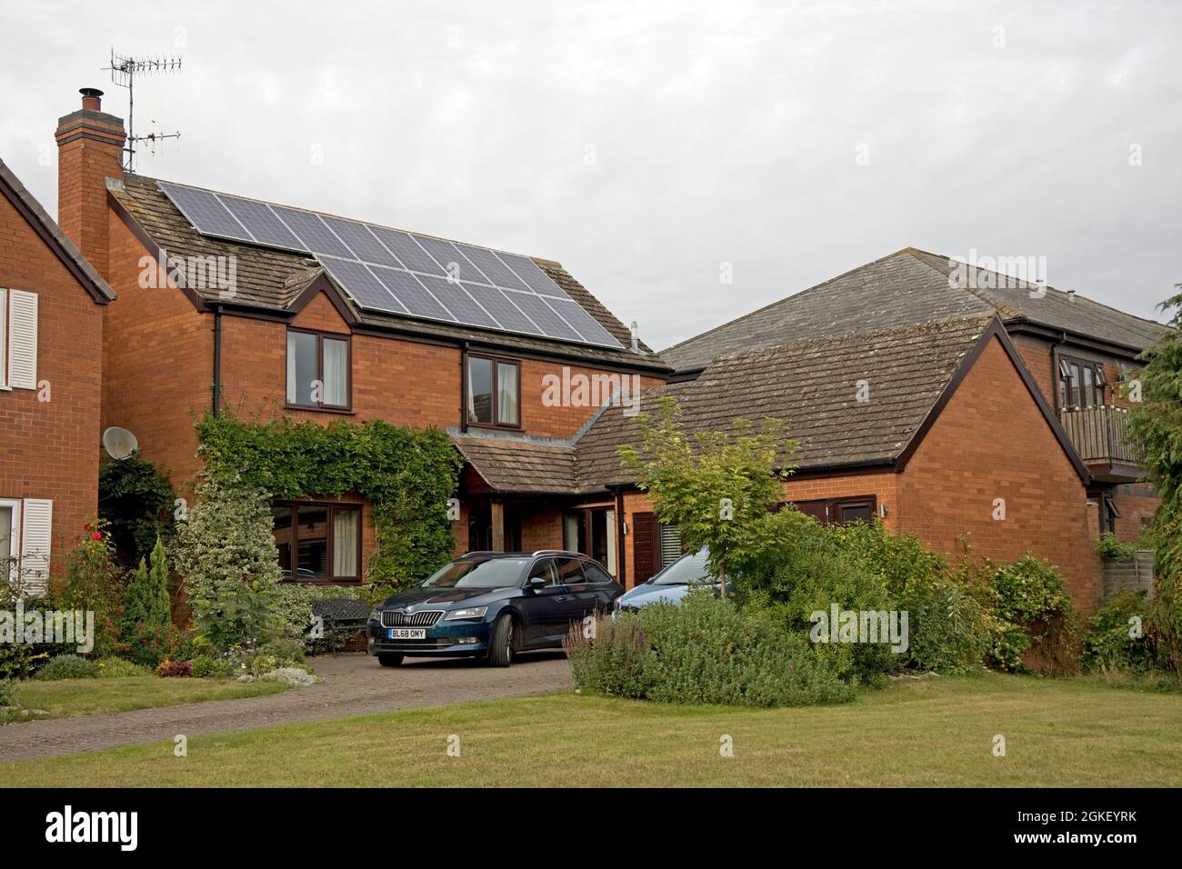 Modern house with solar panels hi-res stock photography and images - Alamy