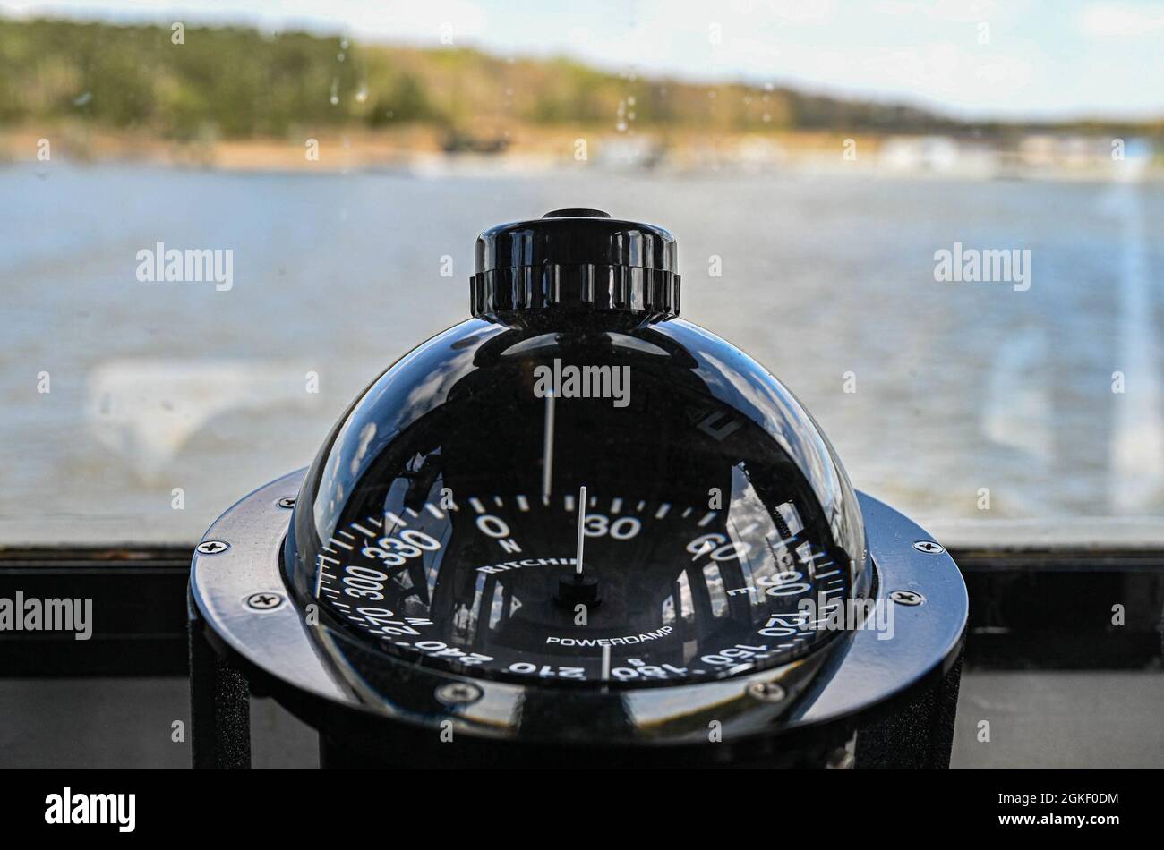 The compass aboard a U.S. Army ship points points towards open water at ...