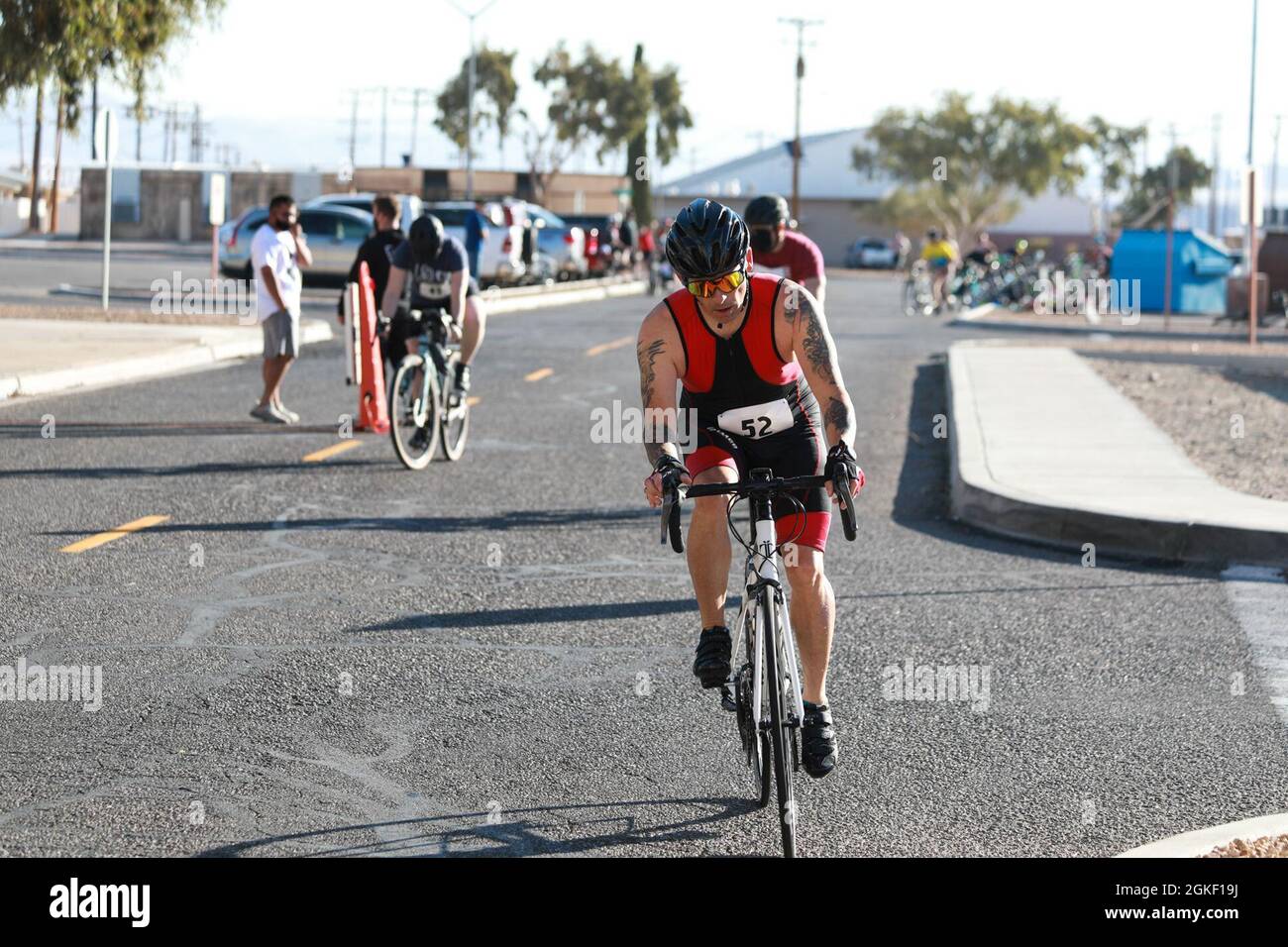 Service members, their families, and civilians participate in the ...