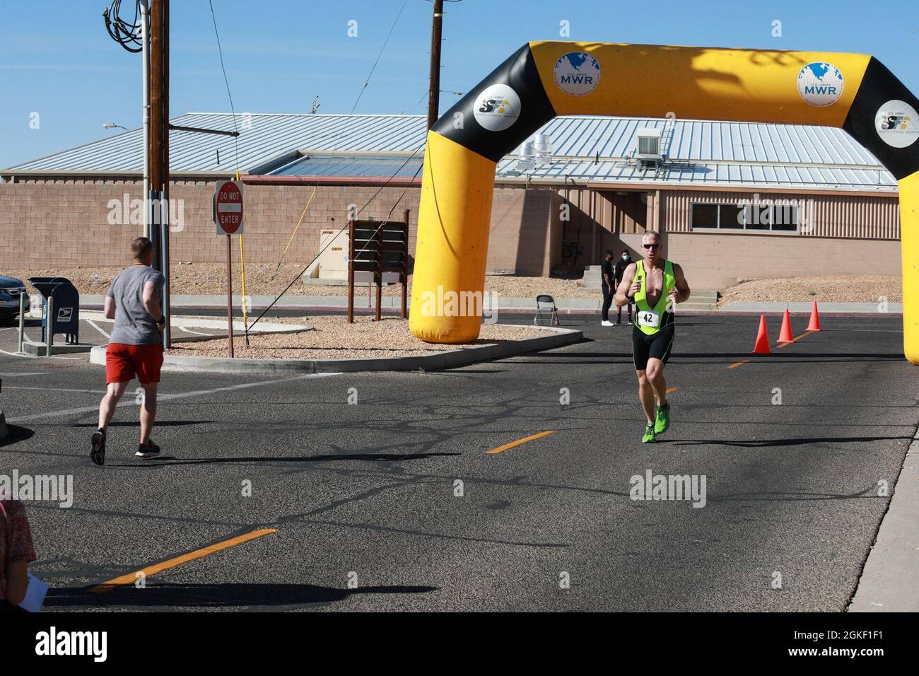 Service members, their families, and civilians participate in the ...