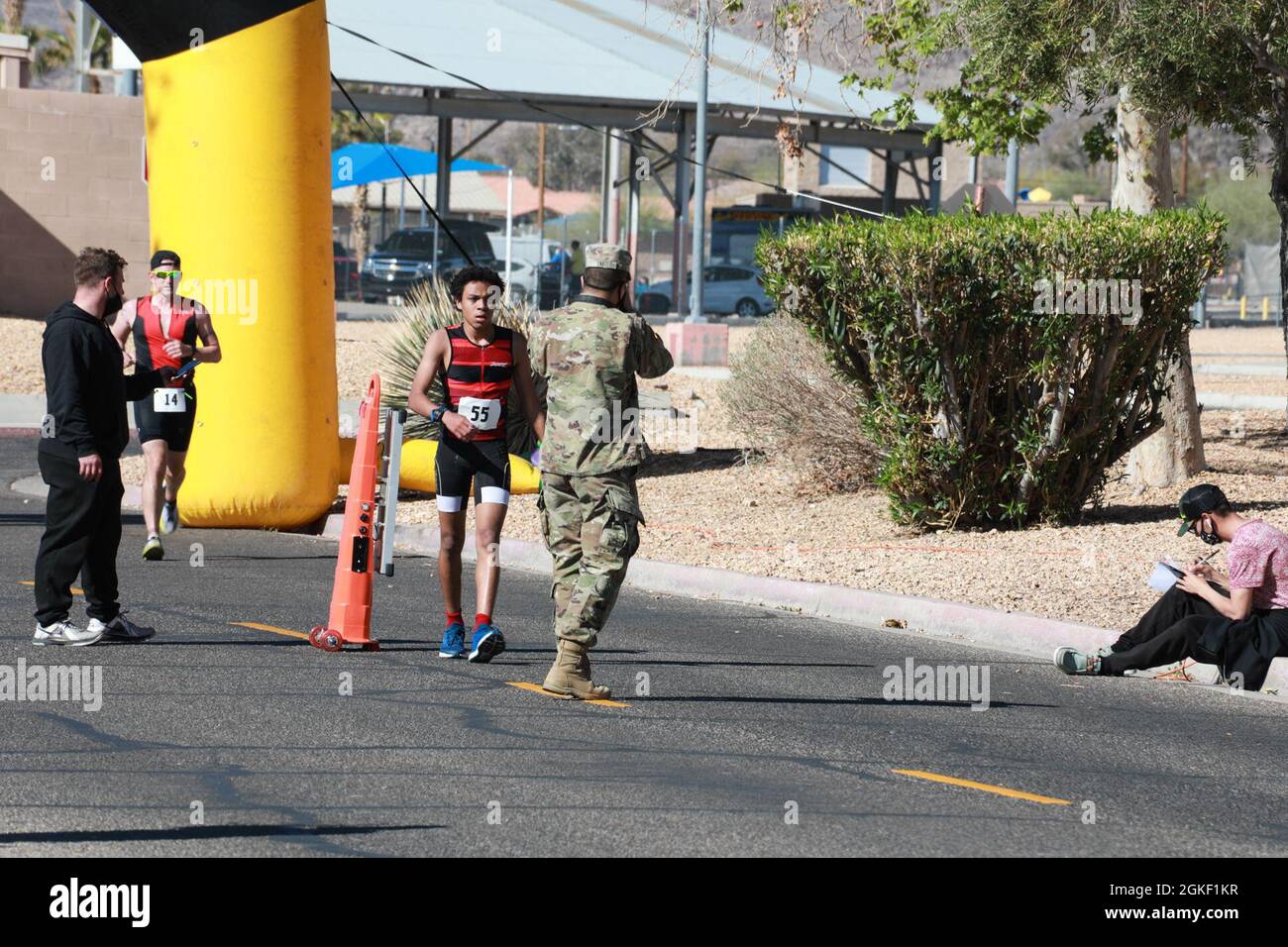 Service members, their families, and civilians participate in the ...