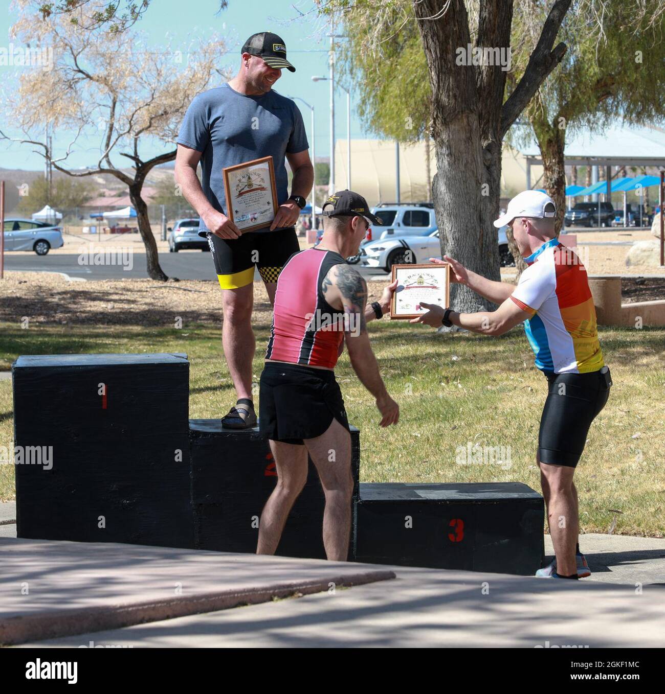 Service members, their families, and civilians participate in the ...