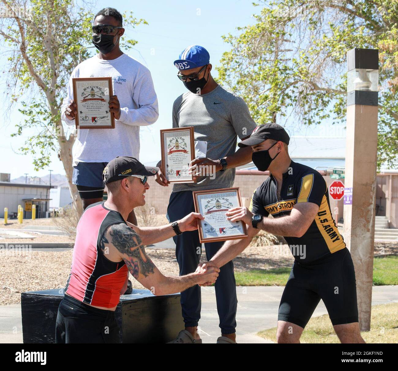 Service members, their families, and civilians participate in the ...