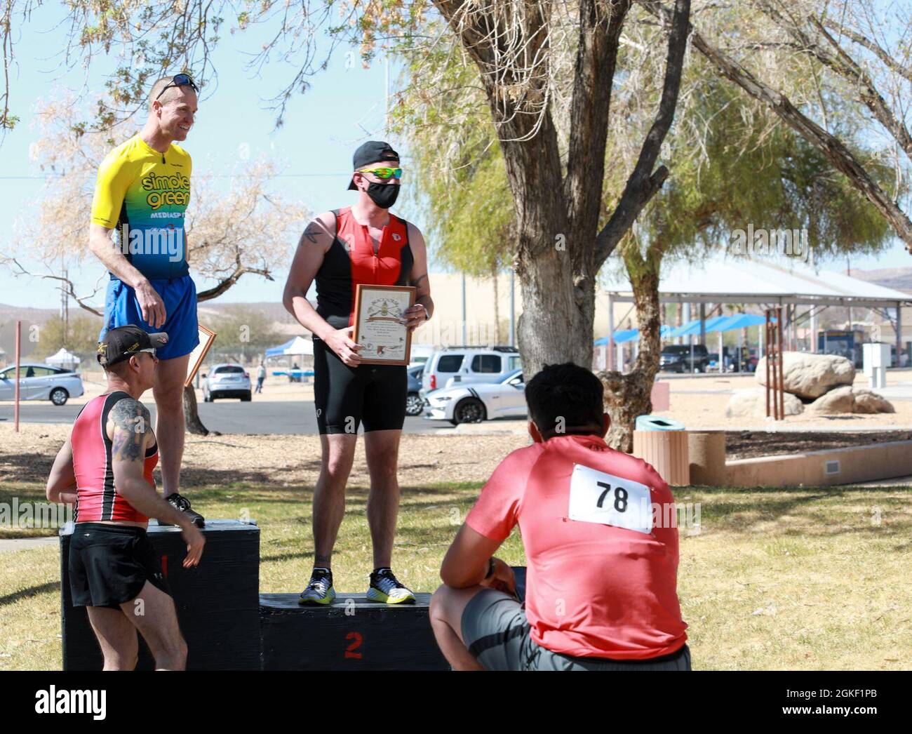 Service members, their families, and civilians participate in the ...