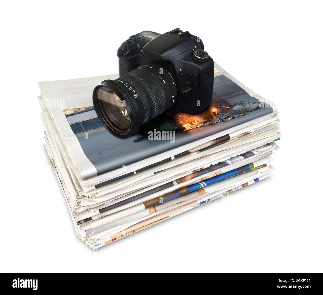 Photo journalism, stack of newspapers with camera on top isolated on ...