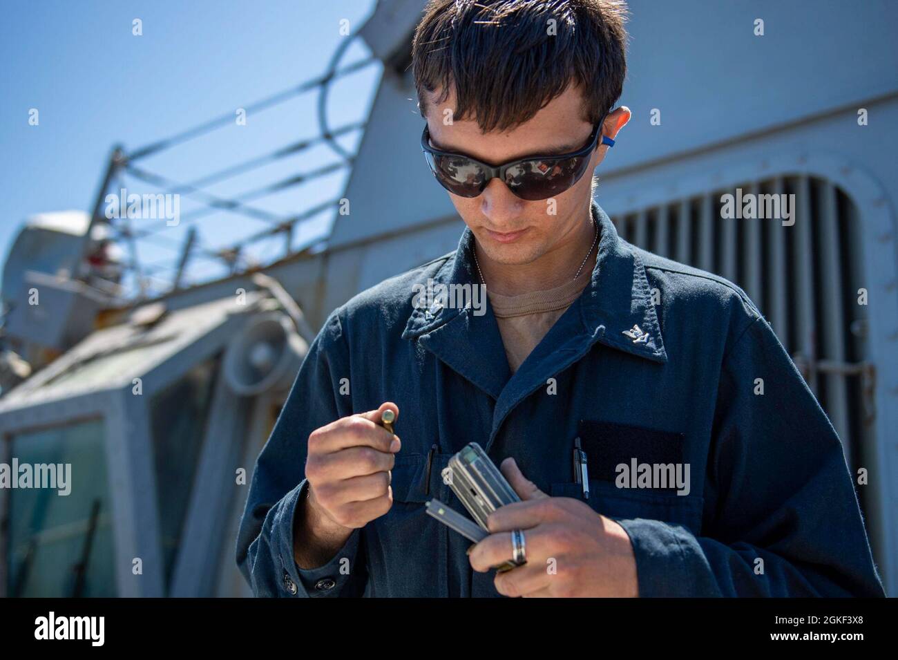 ARABIAN GULF (April 5, 2021) – Gunner’s Mate 3rd Class Corey Crumley ...