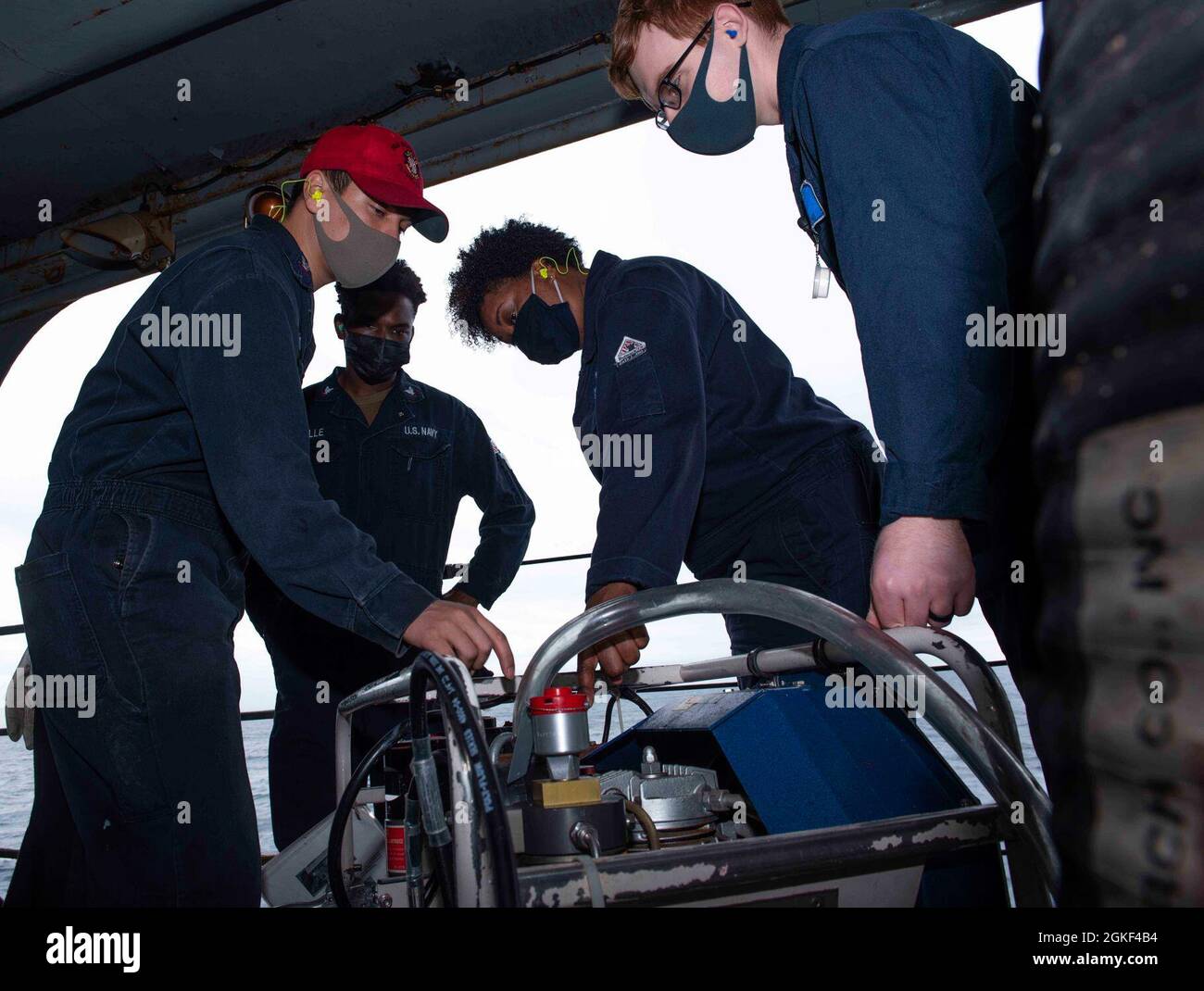 NORTH PACIFIC OCEAN (April 5, 2021) - Sailors conduct maintenance on an ...
