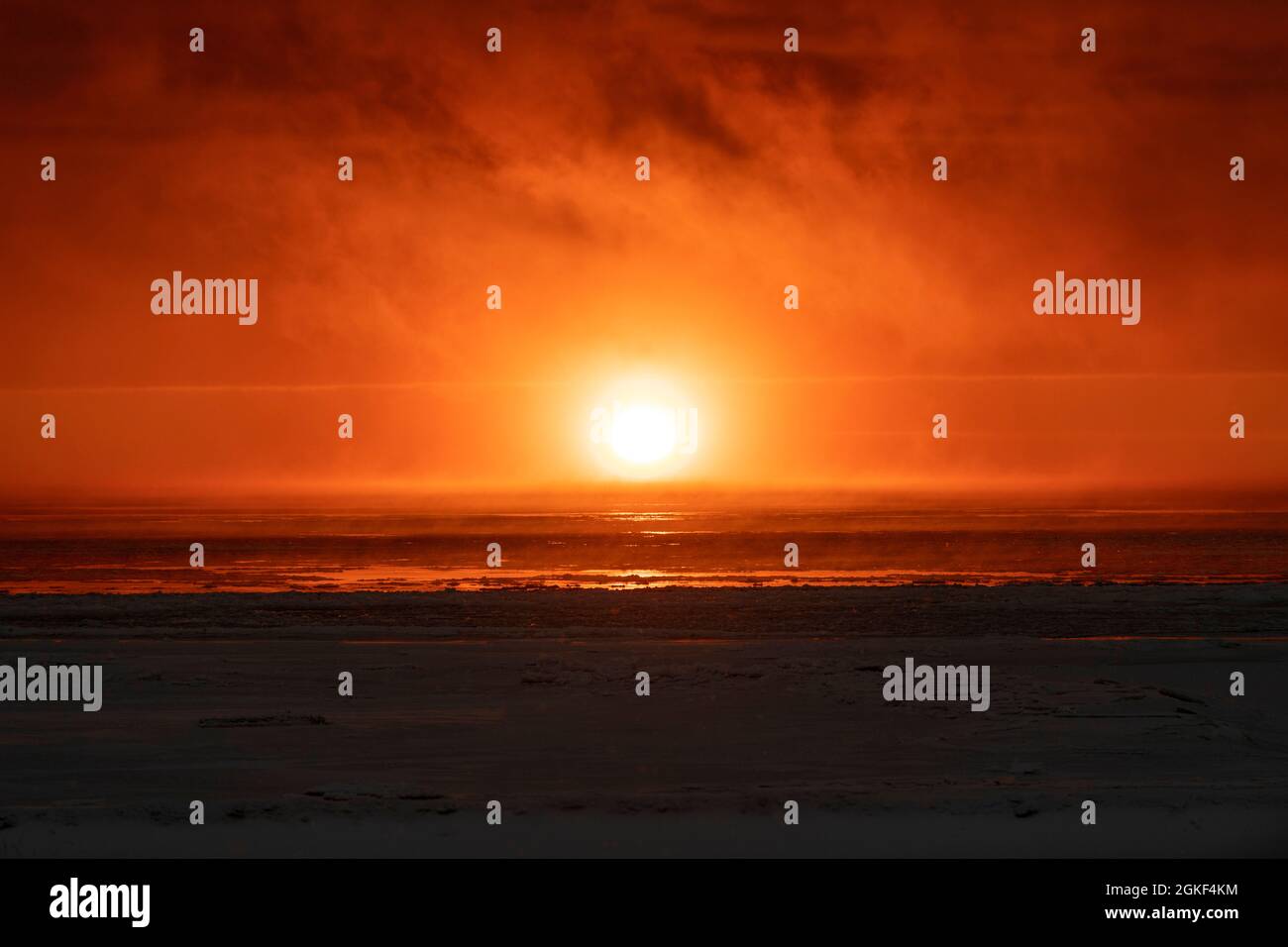 Beautiful sunset with fog in Arctic sea Stock Photo - Alamy