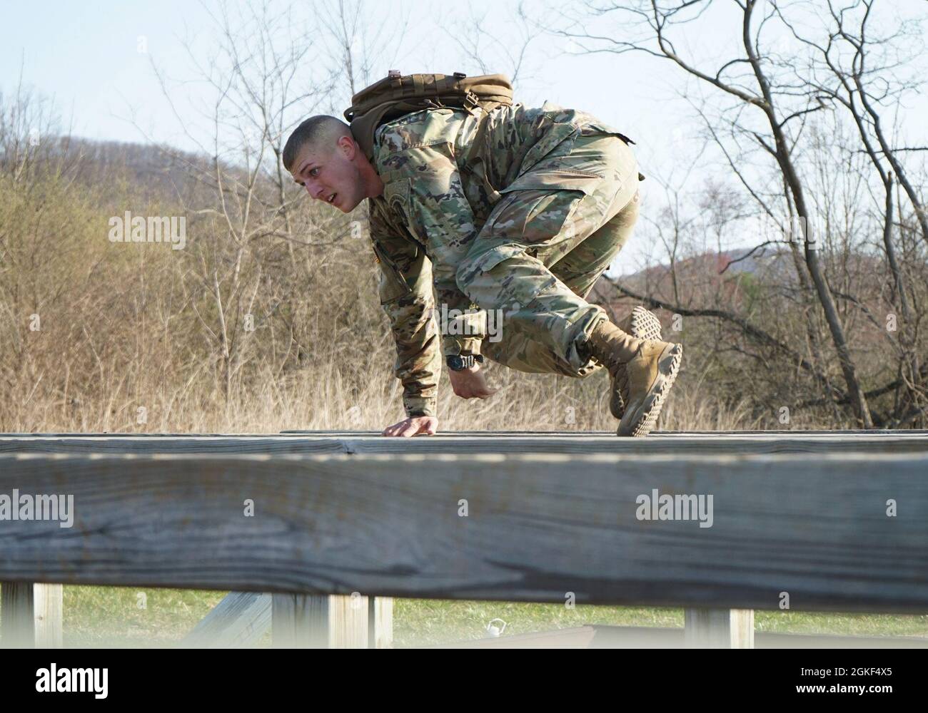 A Soldier, part of the Air Assault School at Fort Indiantown Gap, leaps ...