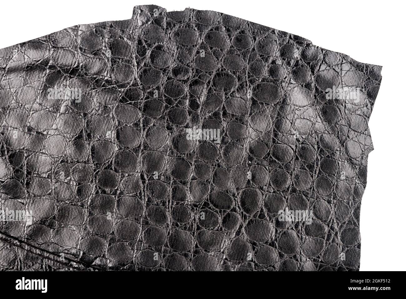 Piece of black artificial leather isolated on white background. Fake ...