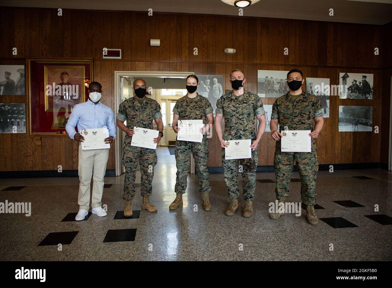 U.S. Marines receive their awards at the President's Volunteer Service ...