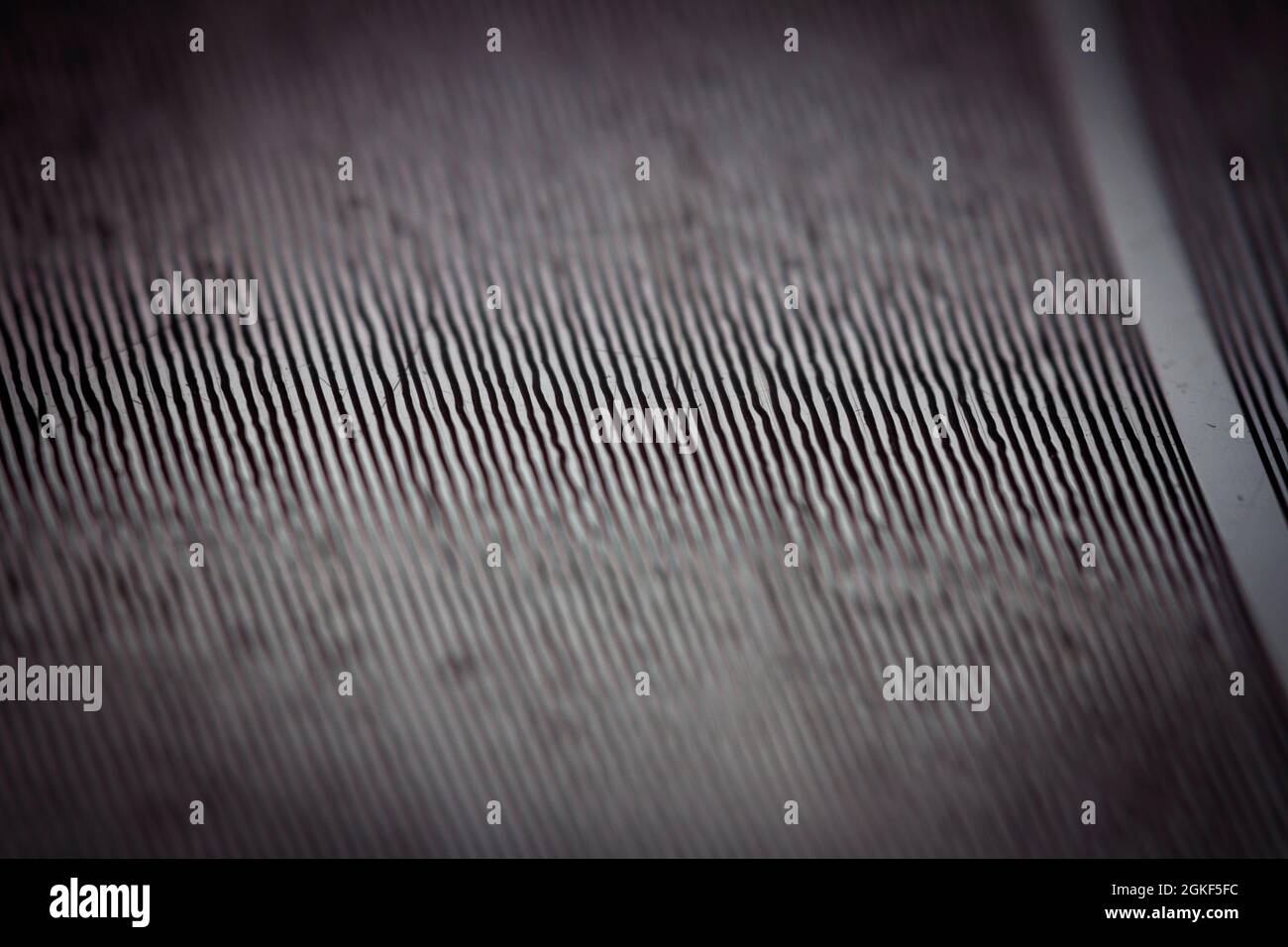Macro shot of black vinyl record showing scratches. Surface of an old ...