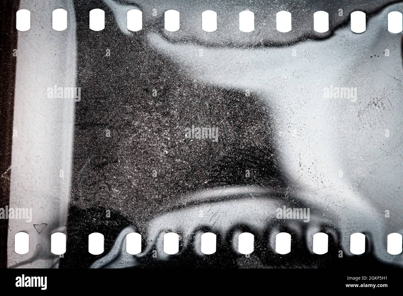 Dusty and grungy 35mm film texture or surface. Perforated camera film ...