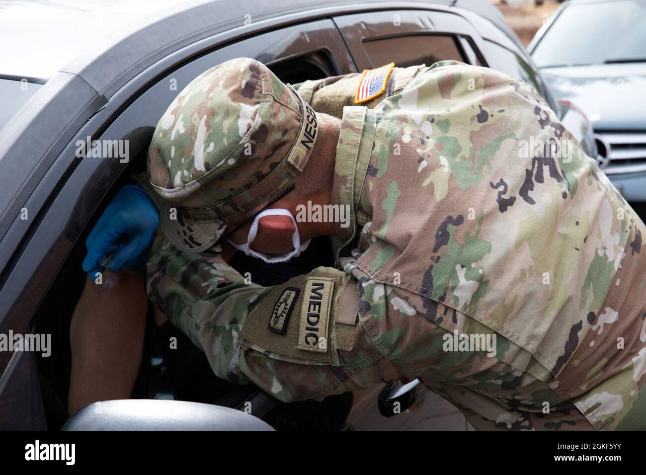 Sgt. Matthew Nesbit, a medic sergeant with HHC 1-200th Inf. Batt., NMNG ...