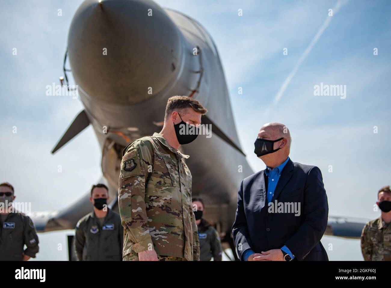 Col. James Young, 317th Airlift Wing commander, talks with Acting ...