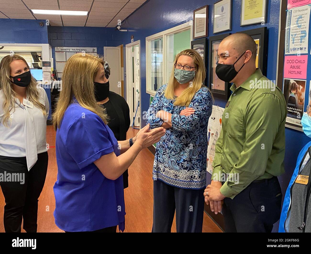 Julie Camerer, center, wife of U.S. Air Force Maj. Gen. Mark Camerer, U ...