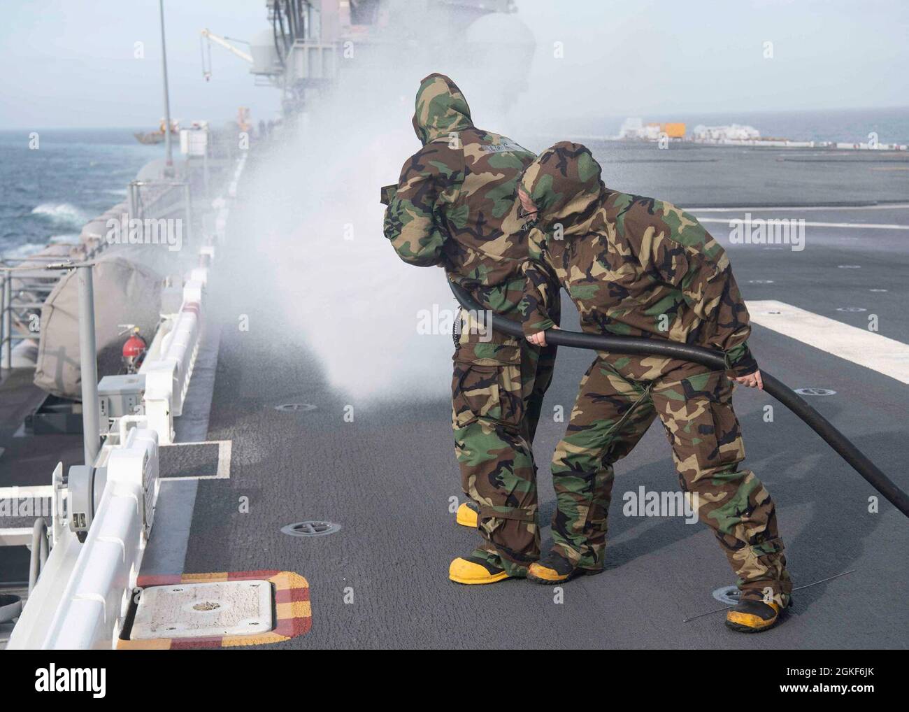 PACIFIC OCEAN (April 6, 2021) Sailors agent test an aqueous film ...