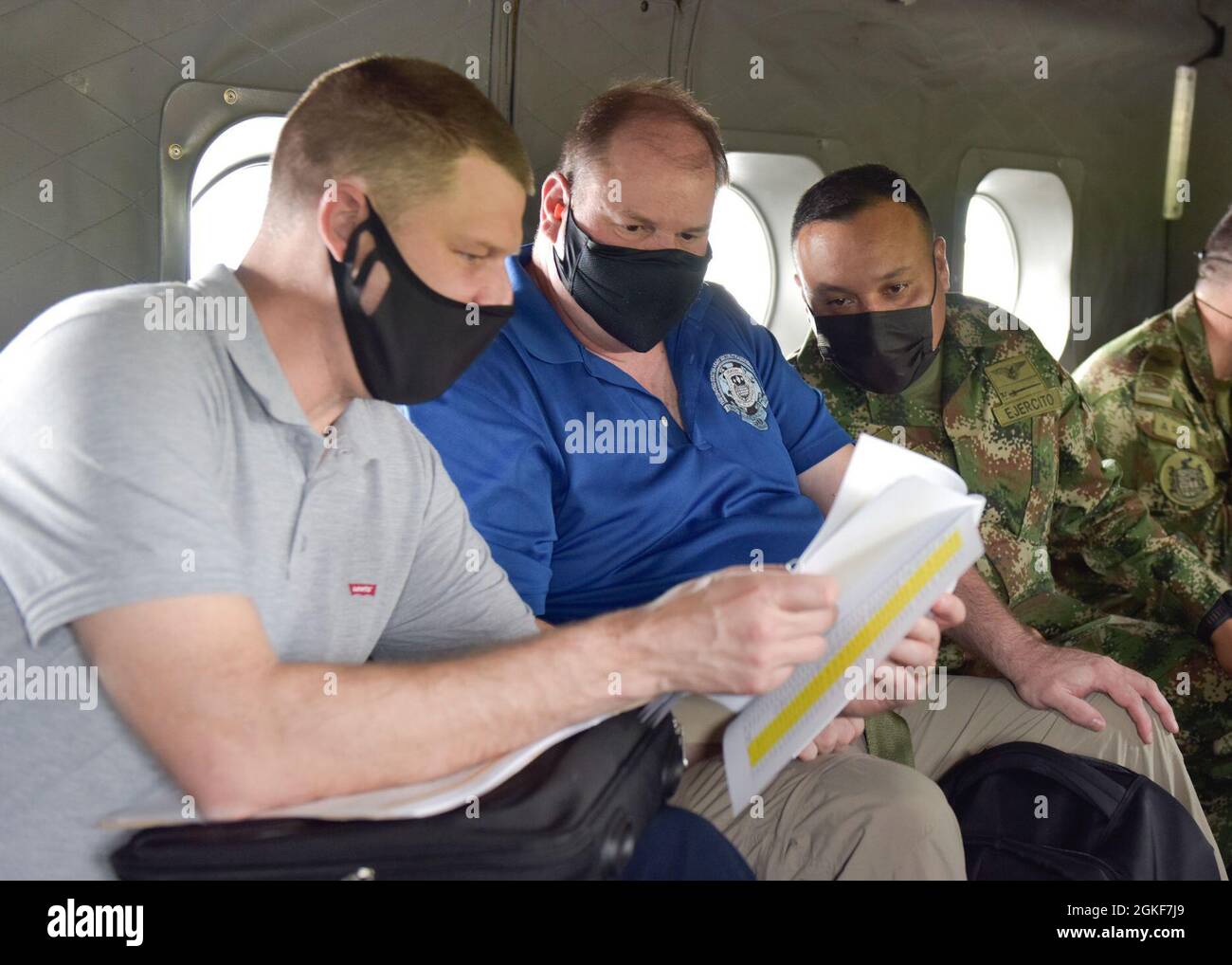 Joe Kidwell, left, the Colombian Central Case Manager at U.S. Army ...
