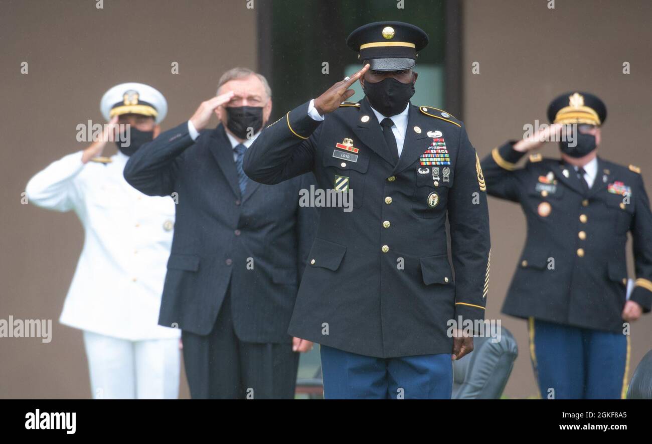 Leadership from the Defense POW/MIA Accounting Agency (DPAA), salute ...