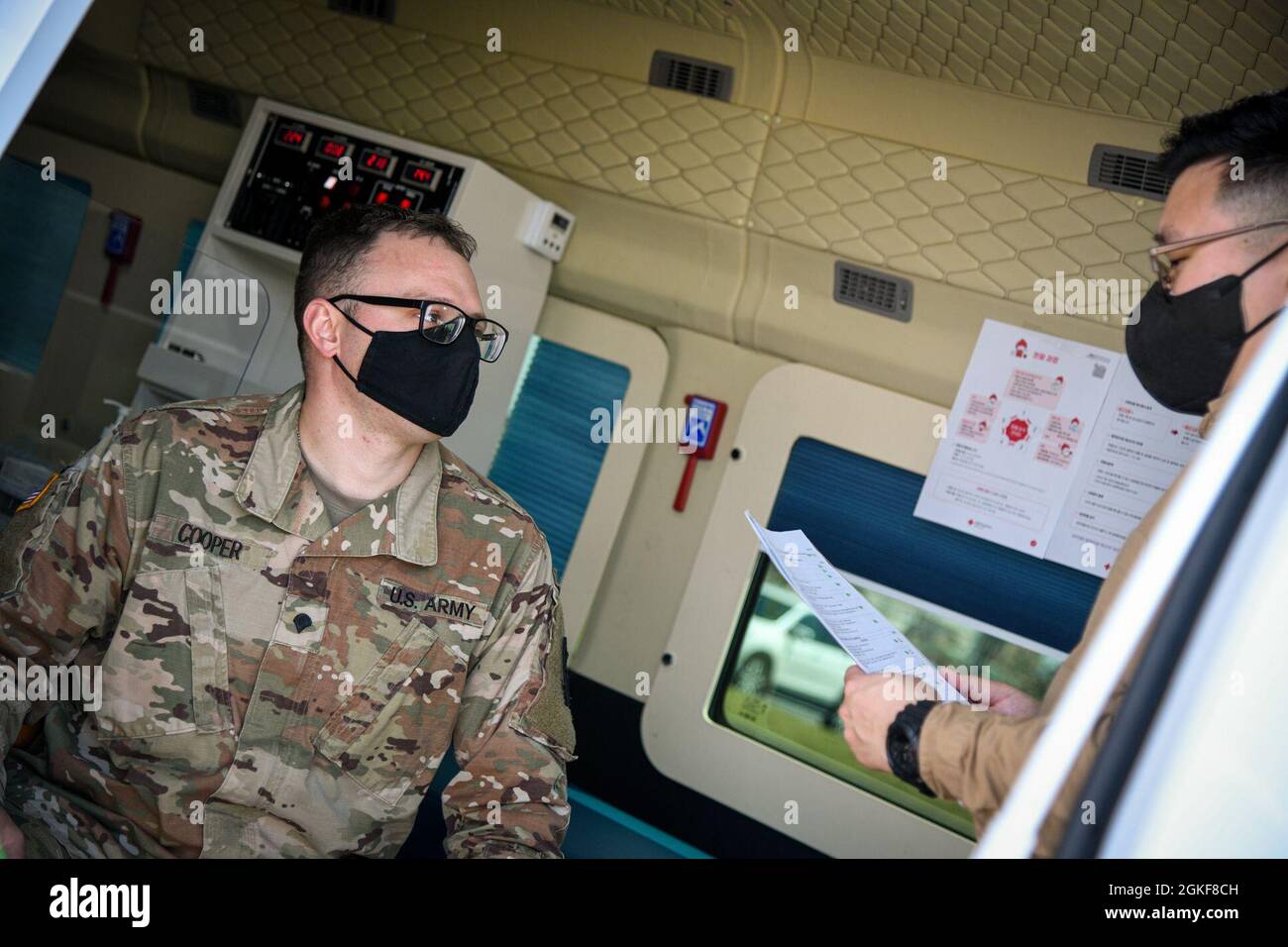 CAMP HUMPHREYS, Republic of Korea - Spc. Michael Cooper, a microwave ...