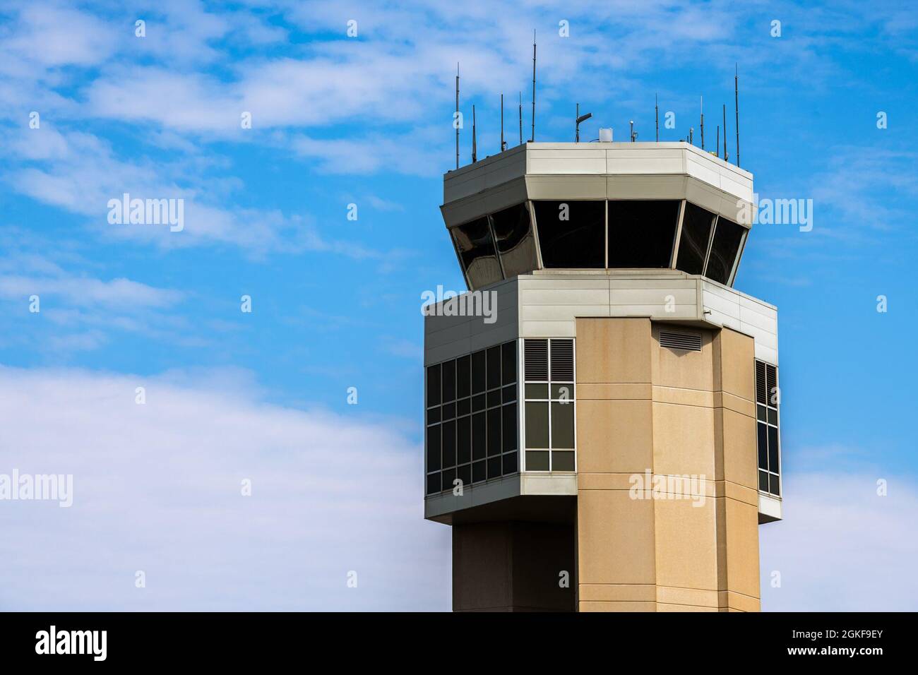 The air traffic control tower keeps watch over the flight line at Dover ...