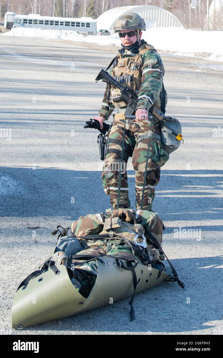 U.S. Air Force Staff Sgt. Marshall Rains, a military working dog ...