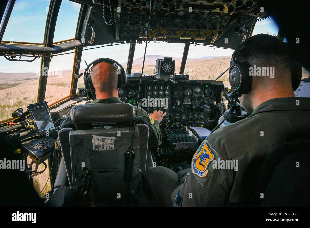 U.S. Air Force Maj. Michael Jacoby (left), 118th Airlift Squadron pilot ...