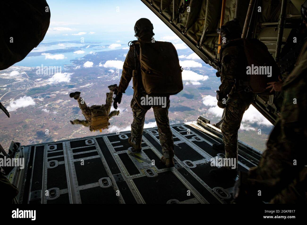 Special Operations Forces members exit a C130J Super Hercules during a high-altitude low-opening ...