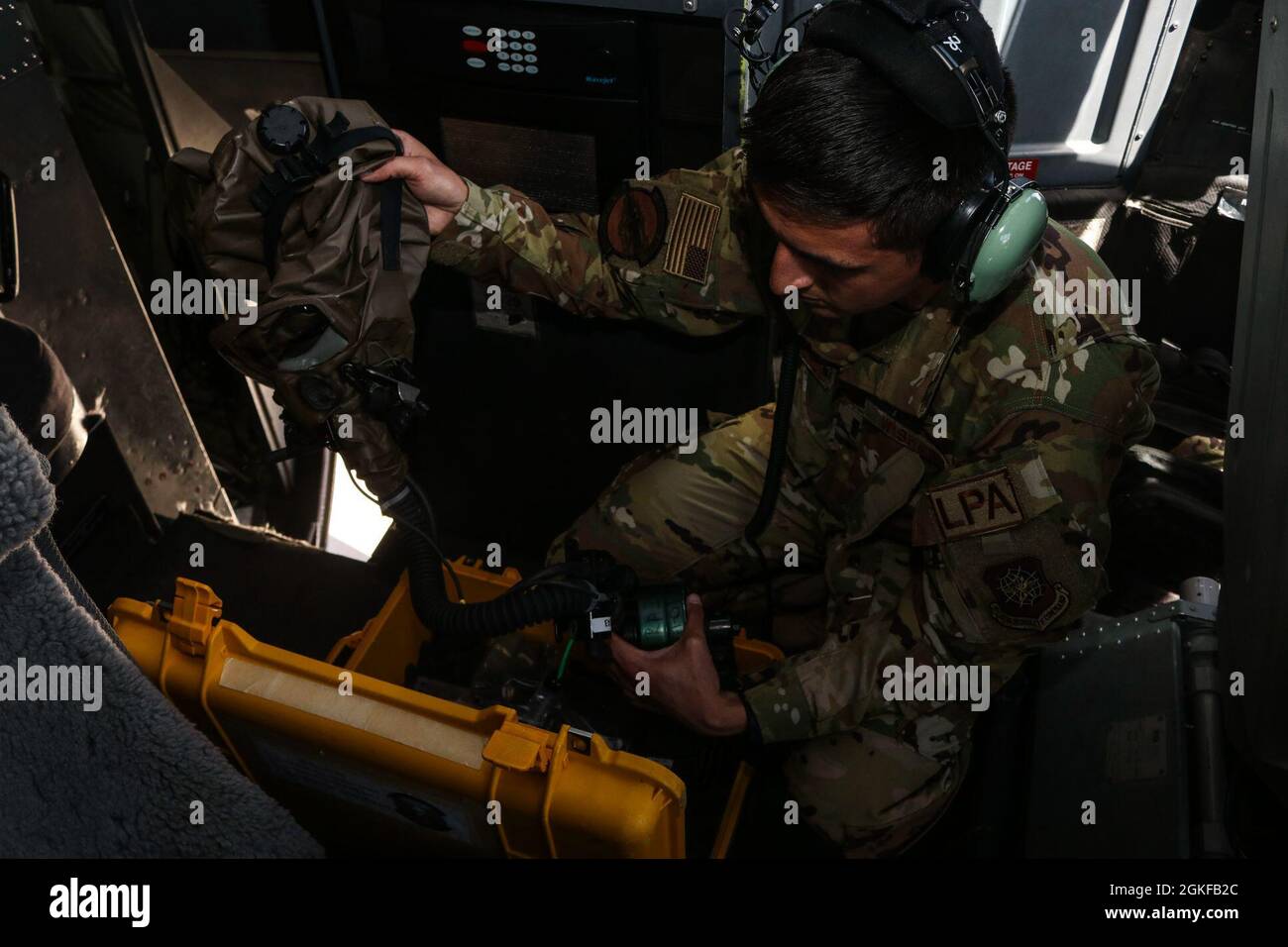 1st Lt. James Wishart, 40th Airlift Squadron co-pilot, puts together ...