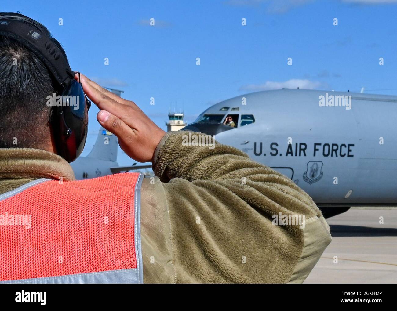 A crew chief from the 507th Aircraft Maintenance Squadron marshals a KC ...