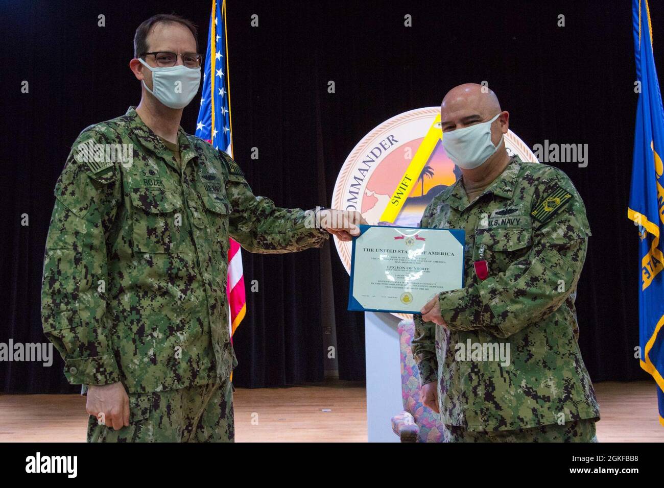 MANAMA, Bahrain (Apr. 8, 2021) – Capt. Eric Rozek, left, a St. Paul ...