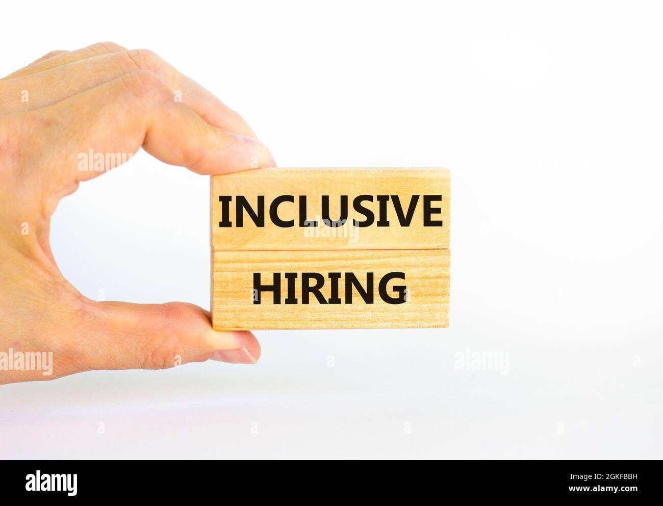 Inclusive hiring symbol. Wooden blocks with words Inclusive hiring on ...