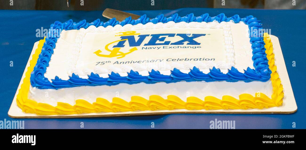 210408-N-ME396-1011 GROTON, Conn. (April 8, 2021) A cake awaits cutting ...