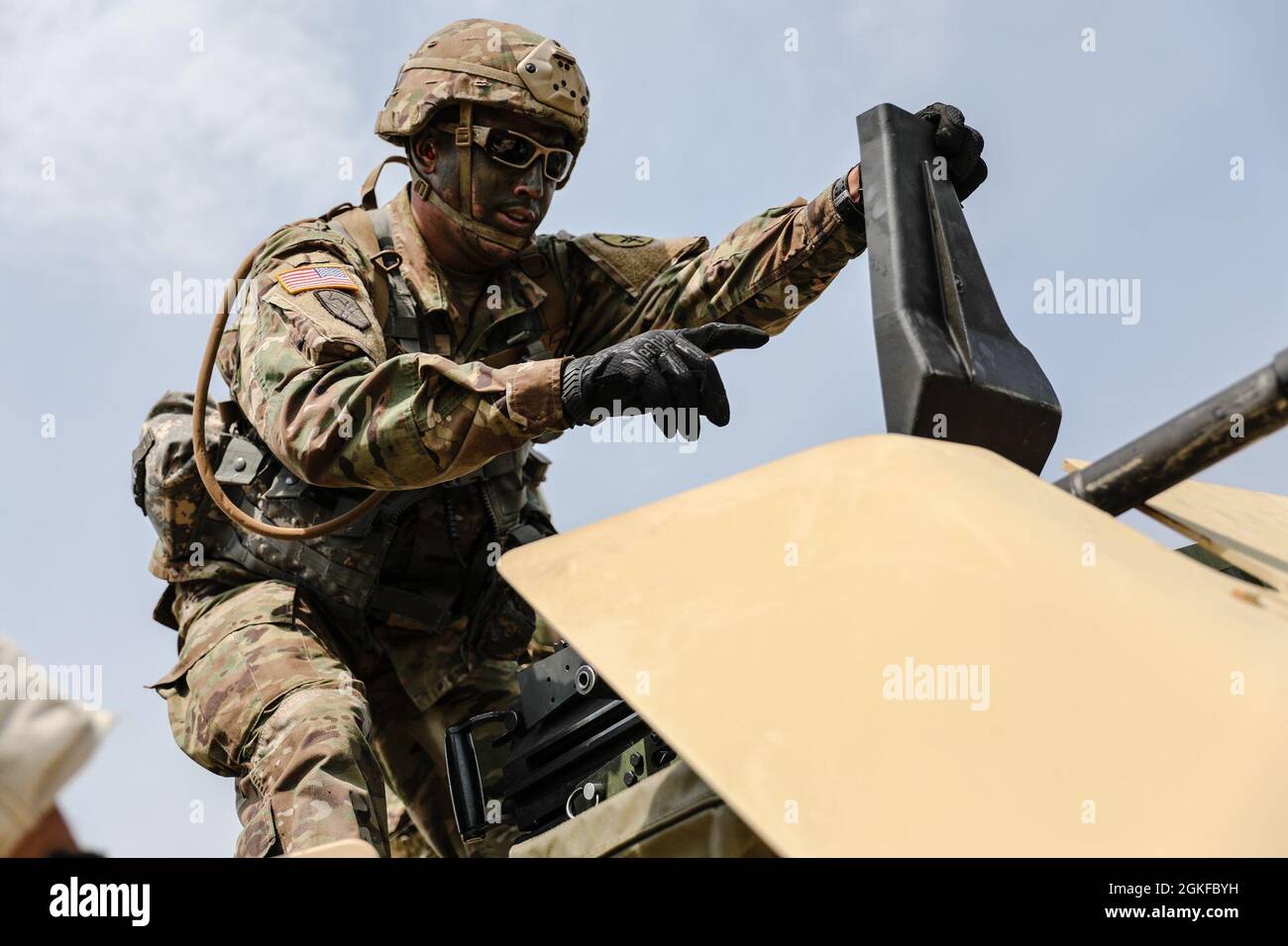 U.S. Army Reserve Staff Sgt. Jonathan Chacon, right, a civil affairs ...