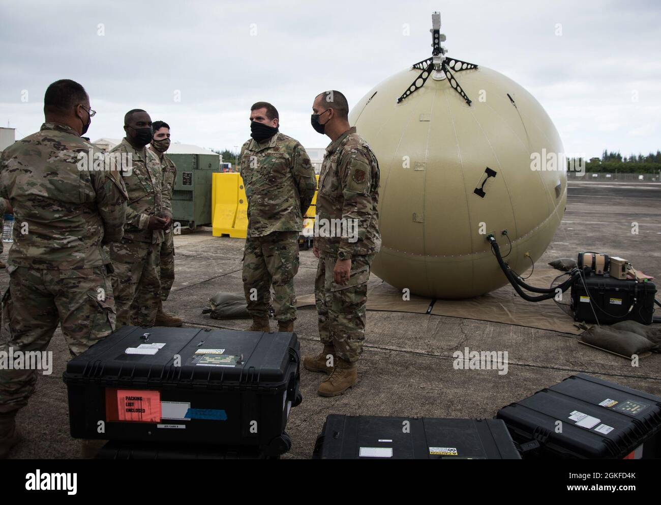 U.S. Air Force Chief Master Sgt. Maurice L. Williams, center left ...