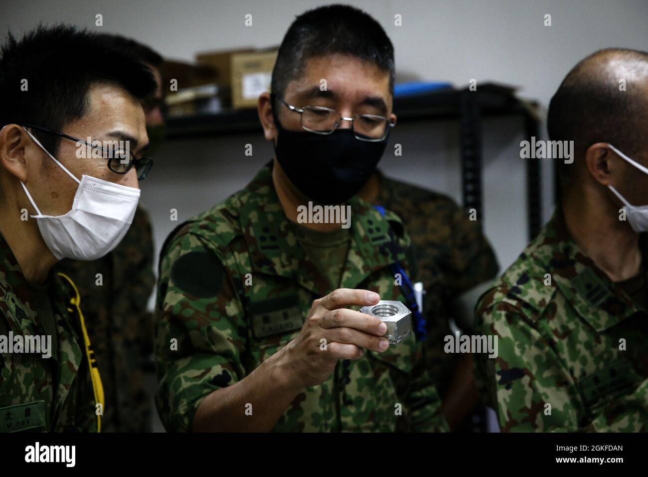 A Japan Ground Self Defense Force (JGSDF) officer with 15th Brigade ...