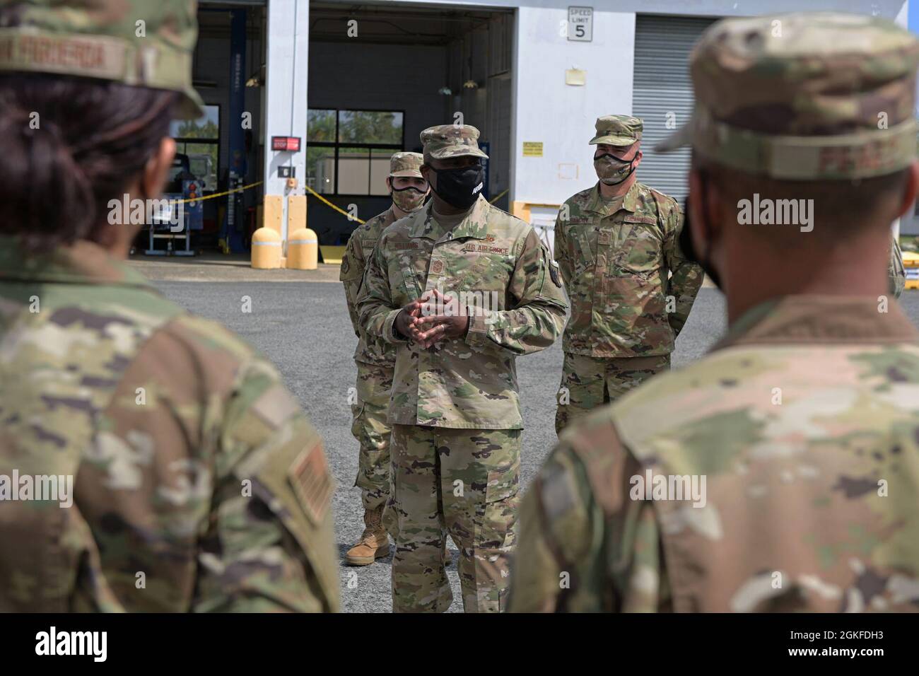 U.S. Air Force Chief Master Sgt. Maurice L. Williams, center, command ...