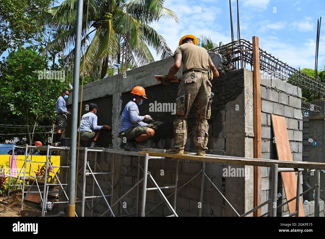 Philippine Navy Seabees with Naval Combat Engineering Brigade, and U.S. Army Staff Sgt. Trevor ...