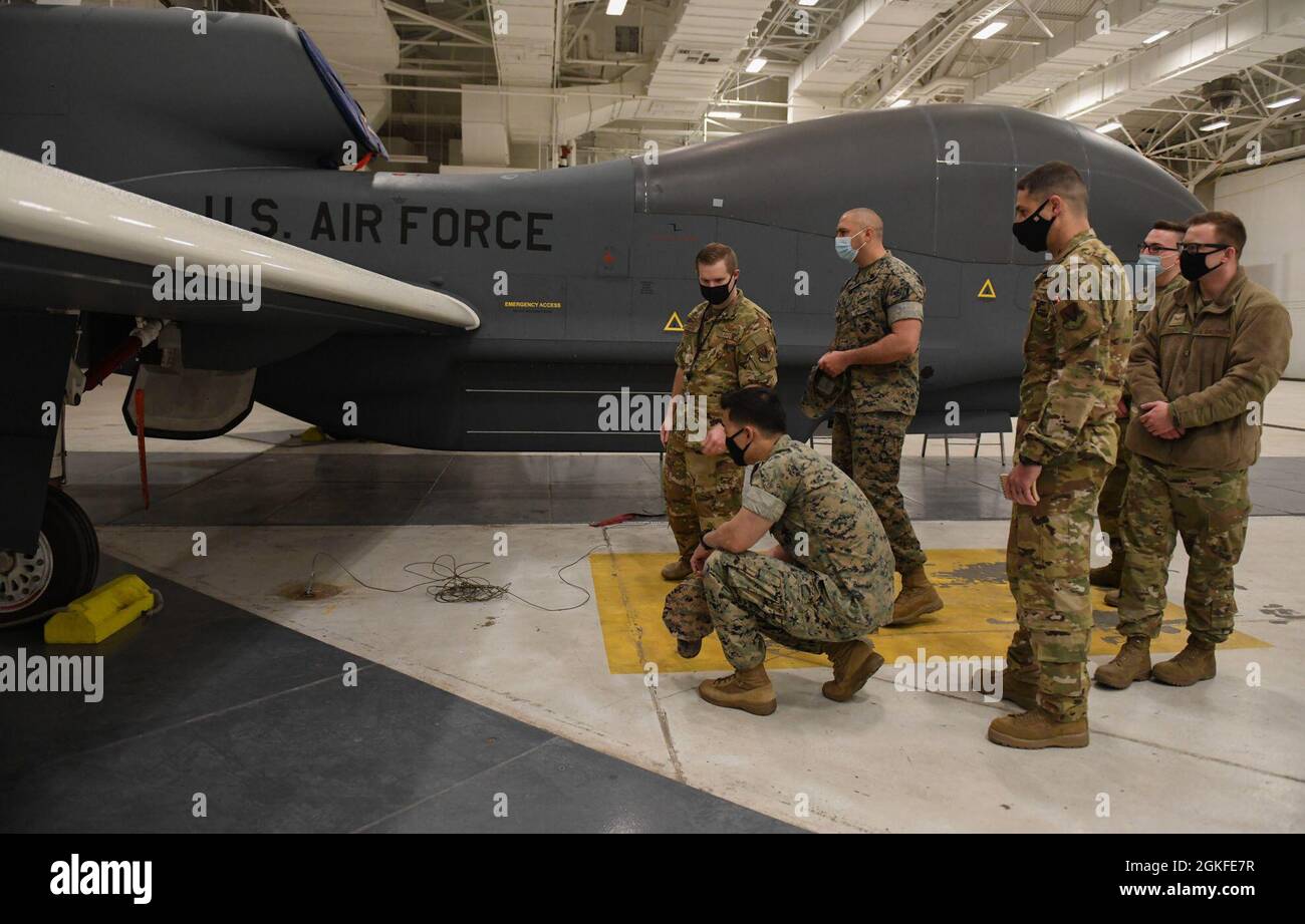 Airmen from the 319th Reconnaissance Wing brief Marines from the II ...