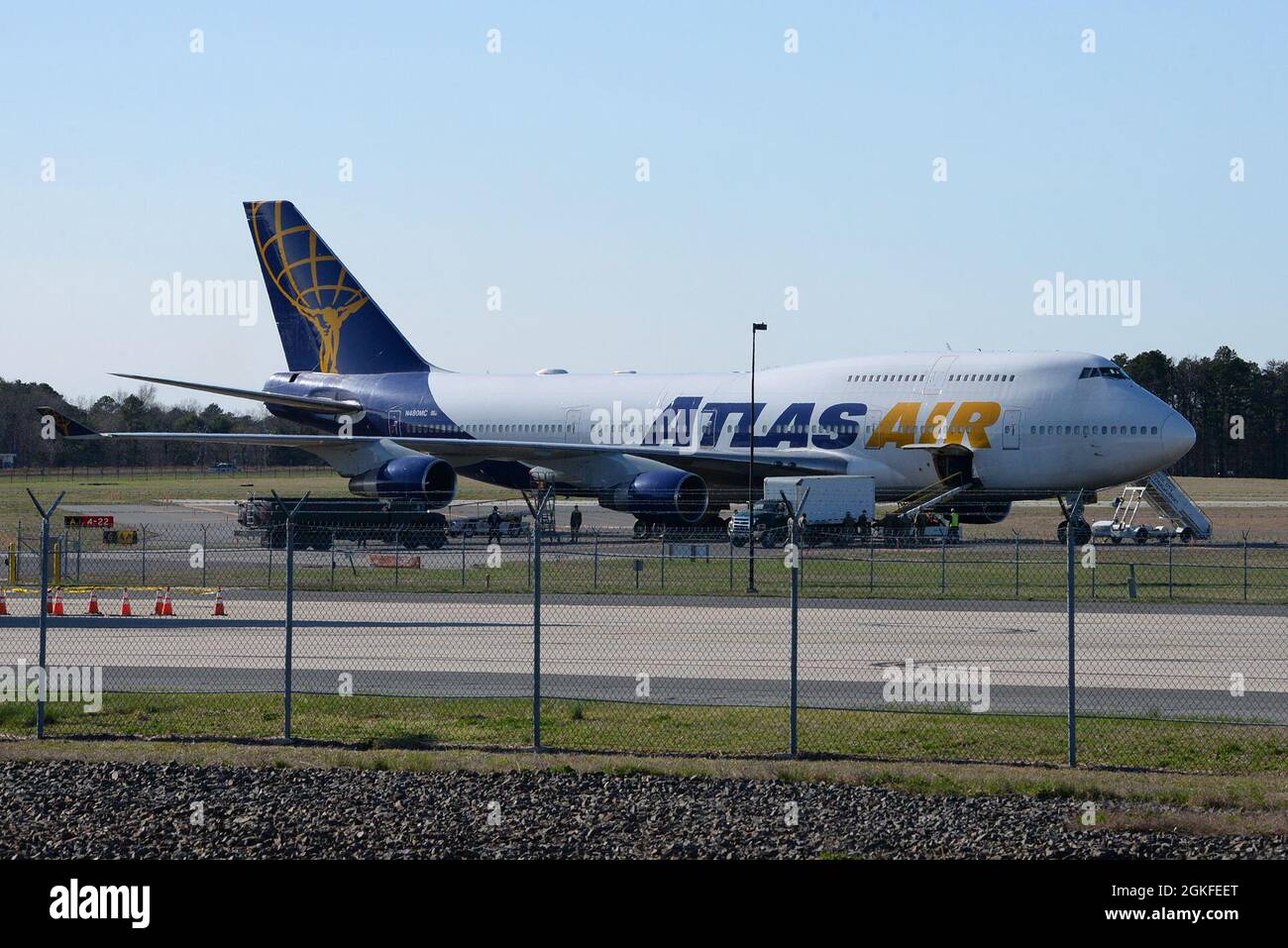 A Boeing 747 rotator aircraft is refueled and loaded with baggage ...