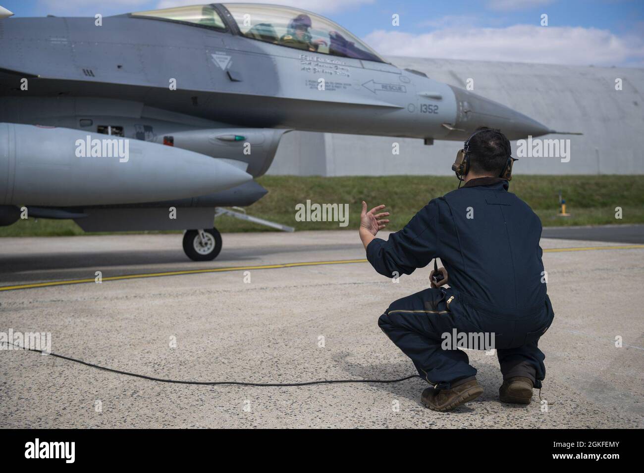 A U.S. Air Force crew chief from the 52nd Fighter Wing Maintenance ...