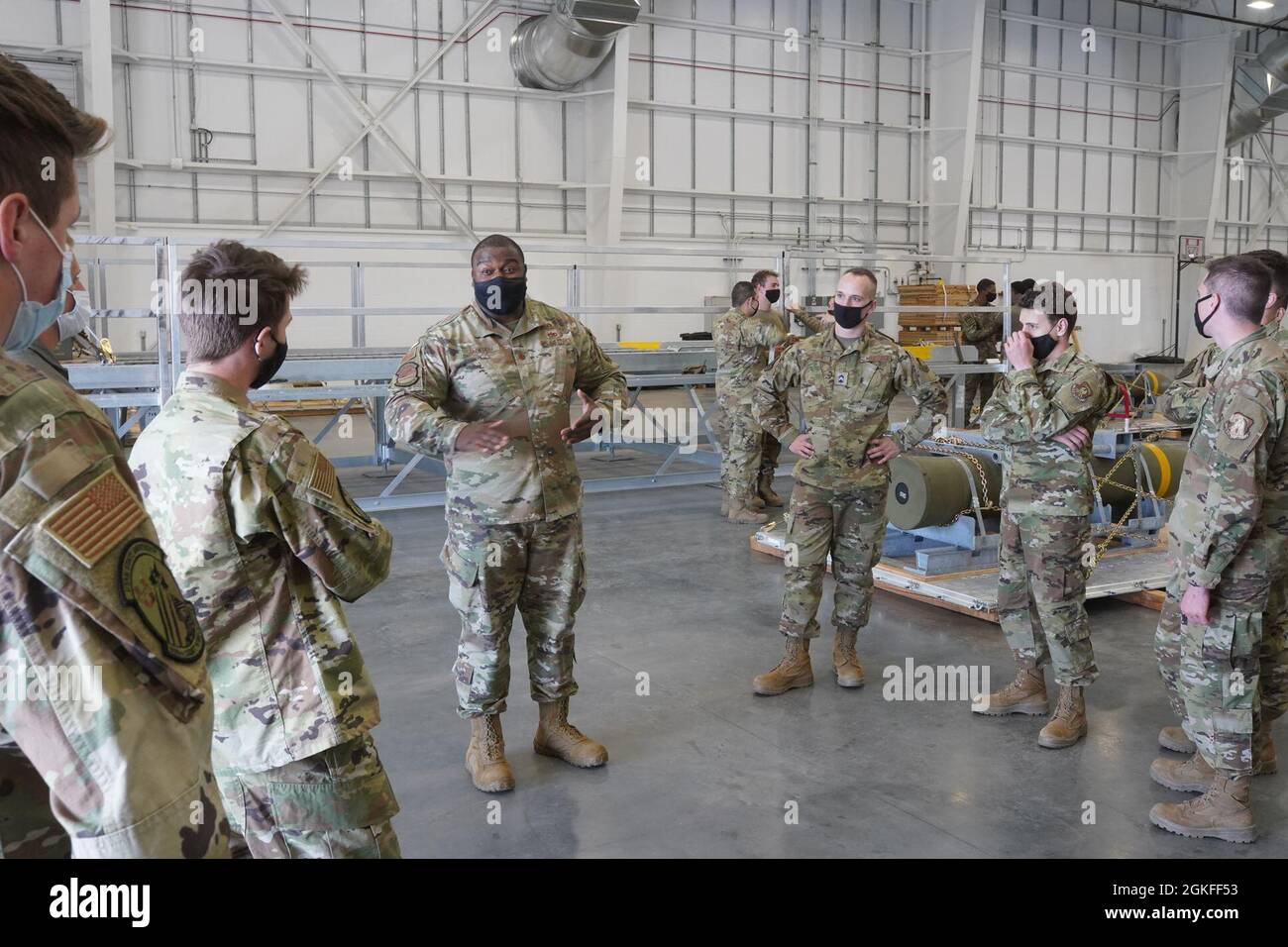 Maj. Lamin Jackson, an operations officer with the 649th Munitions Squadron, briefs Air Force ...
