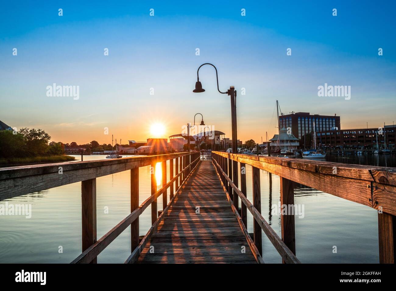 View of Hampton Virginia downtown waterfront district seen at sunset ...