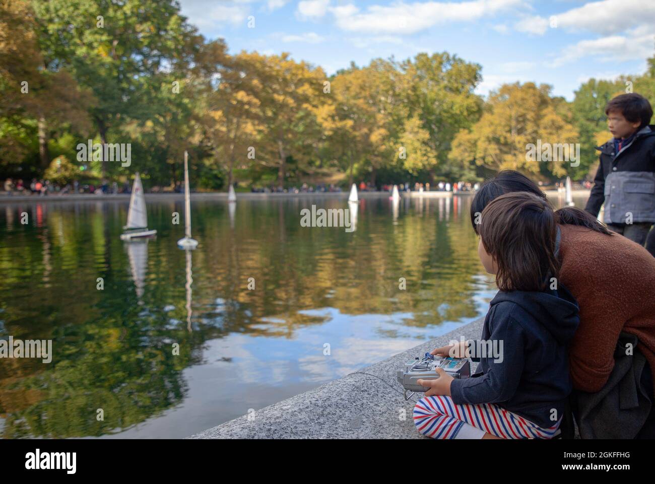 boy in central park Stock Photo - Alamy