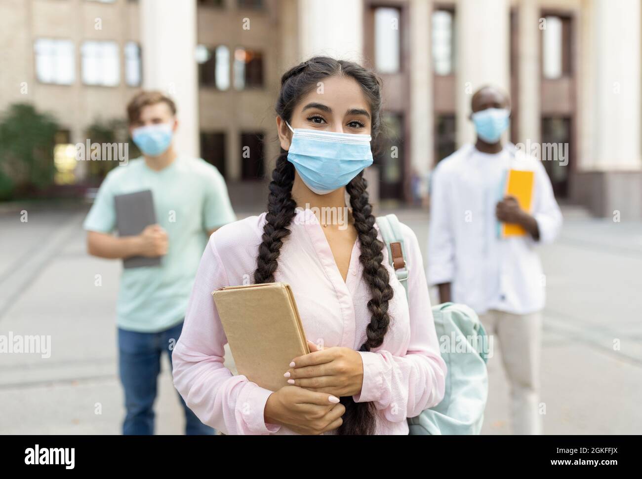 Safe study during covid-19 pandemic. Indian student girl in face mask ...